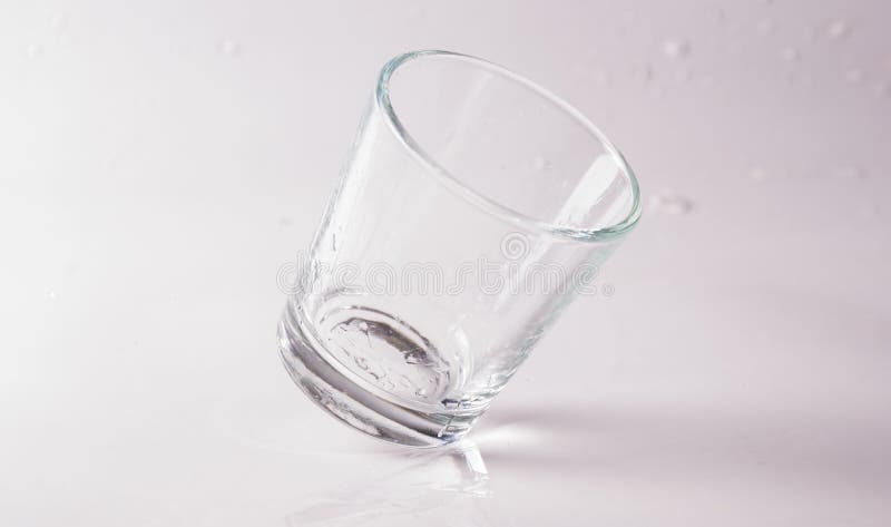 Glasses of Water Falling and Jumping with Splashes and Drops Stock ...