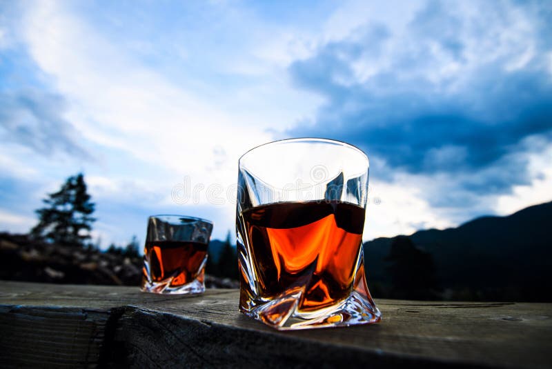 Glasses of Whiskey on Mountain Landscape Background Stock Image - Image ...