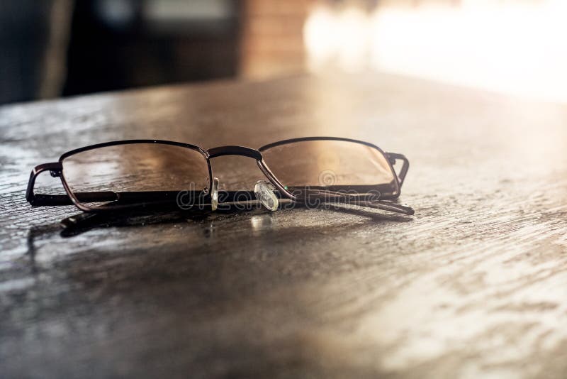 Glasses on a Wooden Table, the Sun`s Rays from the Window Stock Photo ...