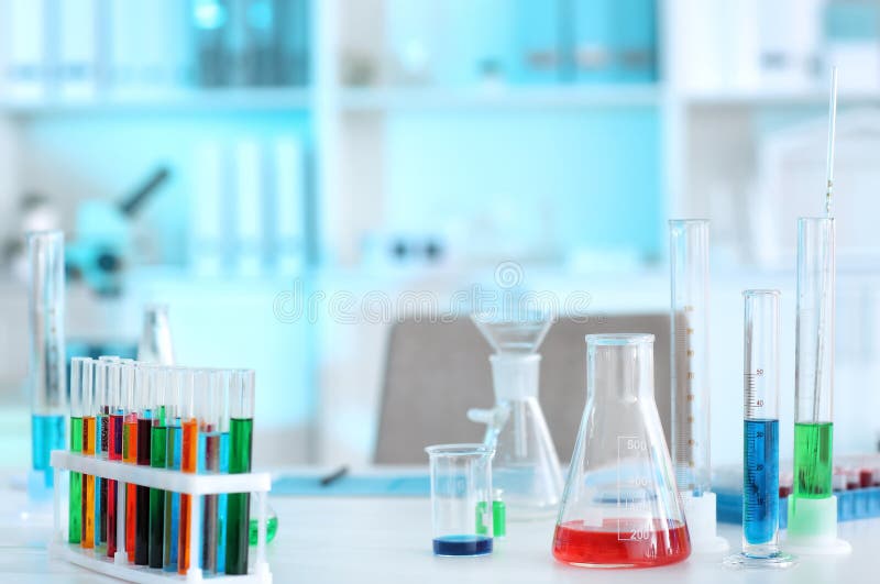 Glassware with Different Samples on Table in Laboratory Stock Photo ...