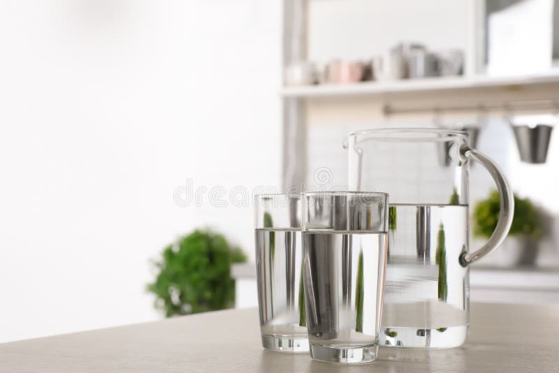 Glassware of Fresh Water on Table Indoors Stock Image - Image of pure ...