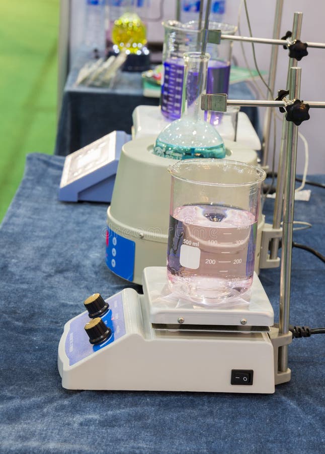 Beaker on magnetic stirrer stock image. Image of chemical - 99859245