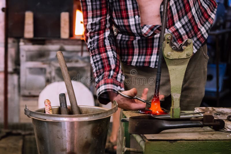 A Glassworks Worker Shows Traditional Methods of Making Decorative ...