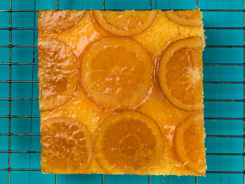 Glazed Candied Orange Sponge Cake Stock Image - Image of flat, blue ...