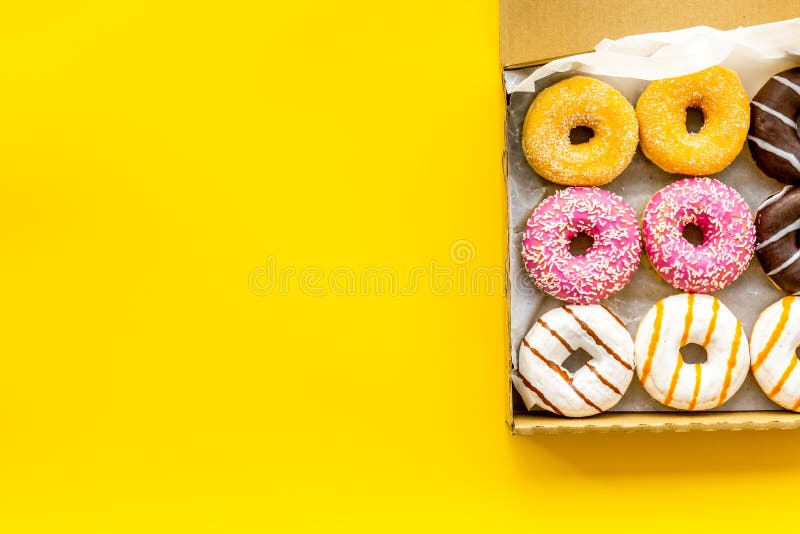 Glazed Decorated Donuts in Box on Yellow Background Flat Lay Mock Up ...