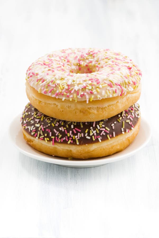 Glazed Donuts Closeup, Vertical Stock Image - Image of dessert, junk ...