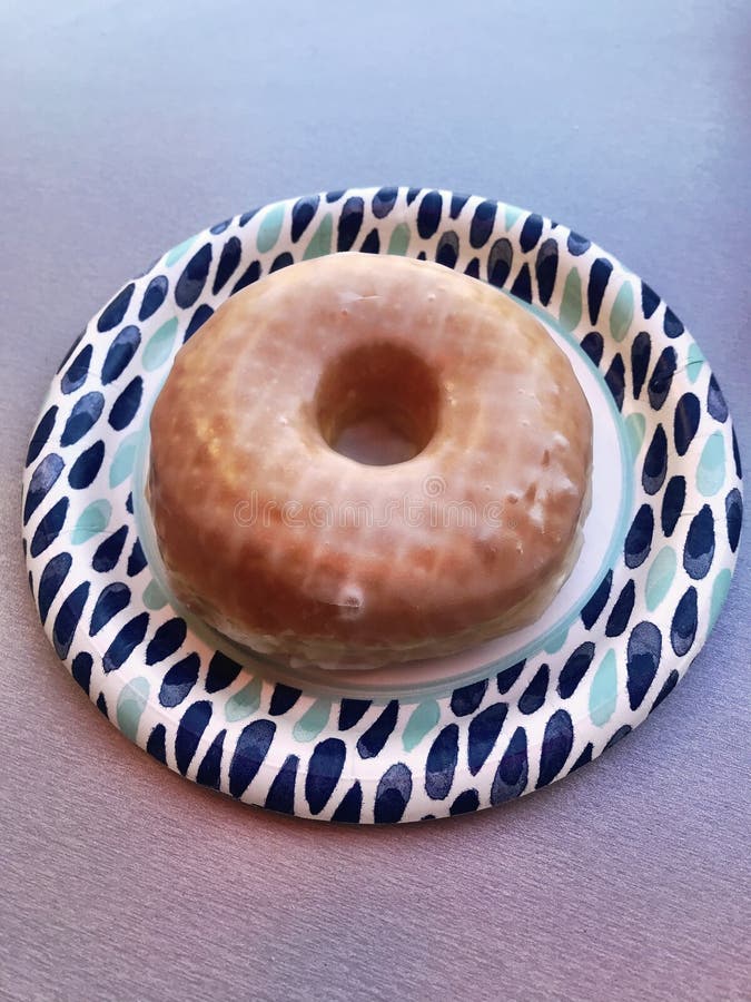 Glazed doughnut stock image. Image of small, treat, plate - 239952519