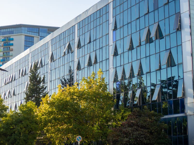 Glazed House with Open Windows. Facade of an Office Building Stock ...