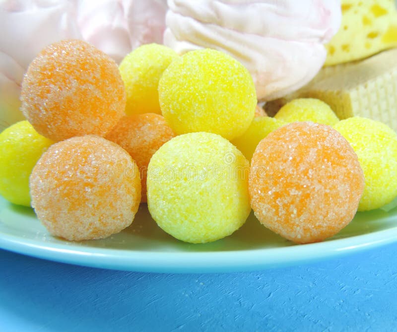 Glazed Peanuts of Different Colors on a Plate, White Background ...