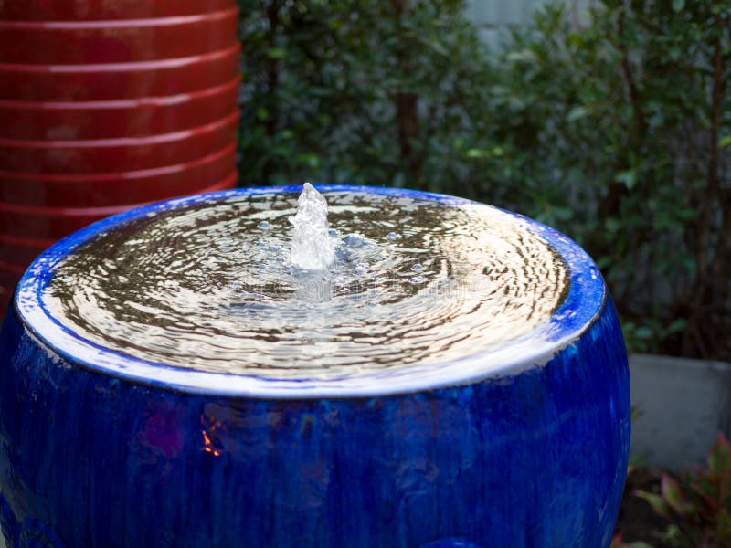 A Glazed Pottery Overflow Fountain Stock Image - Image of shade, white ...