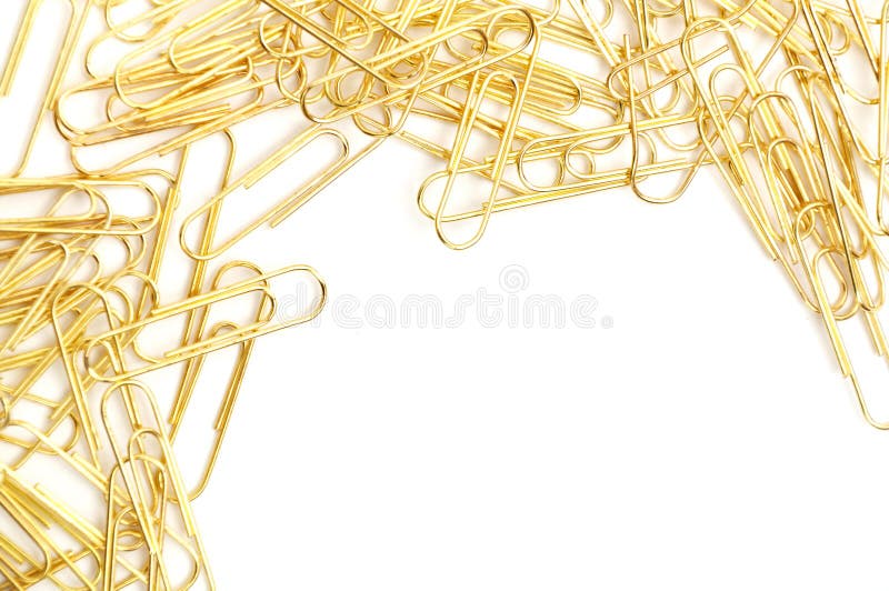 Gleaming golden paperclip stock photo. Image of office - 17253178