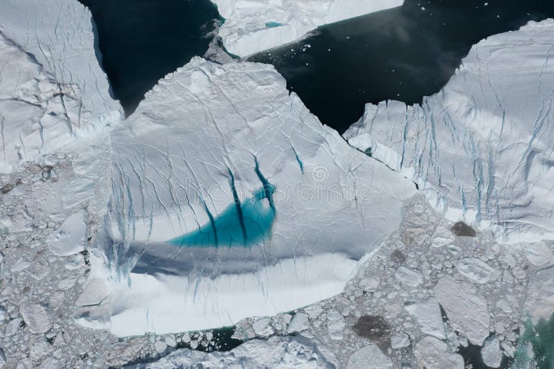 Gletsjers Van Een Smeltende Ijsberg in Ilulissat Groenland. Stock ... Gletsjers Van Een Smeltende Ijsberg in Ilulissat Groenland. Stock ...