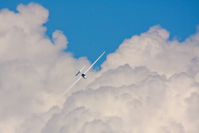 Glider fly into clouds stock photo. Image of glider, hang - 10924642