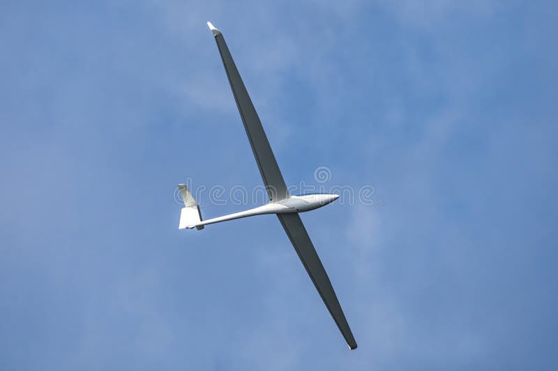 Glider Plane Flying in the Clouds Stock Image - Image of blue, outdoor ...