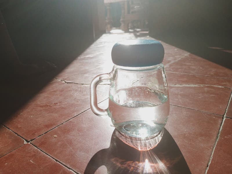 The Glint of Sunlight Shining on a Glass Stock Image - Image of ...