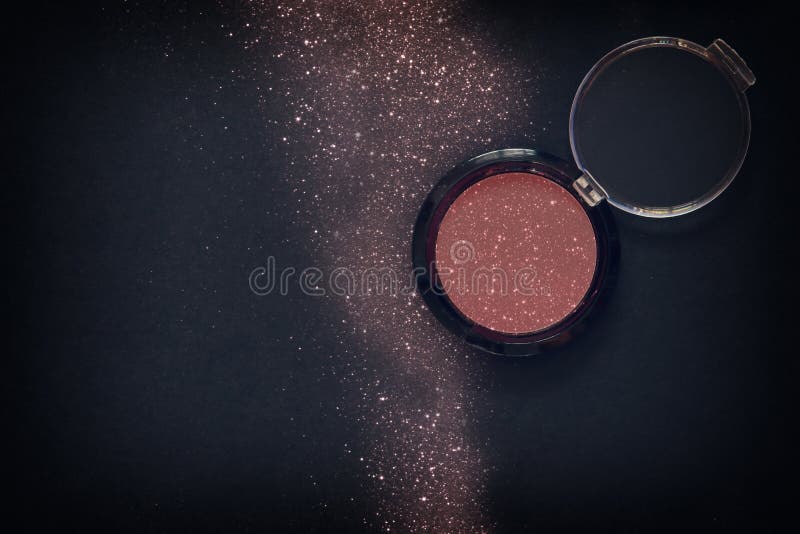 Glitter Make Up Powder Dust on Black Background Stock Photo - Image of ...