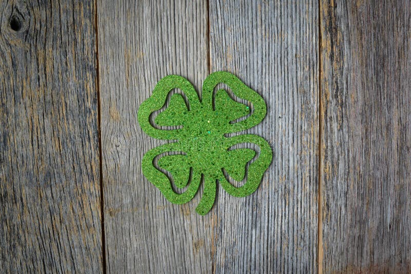 Glitter Shamrock on Green Paper Background. St Patricks Day Symbol ...
