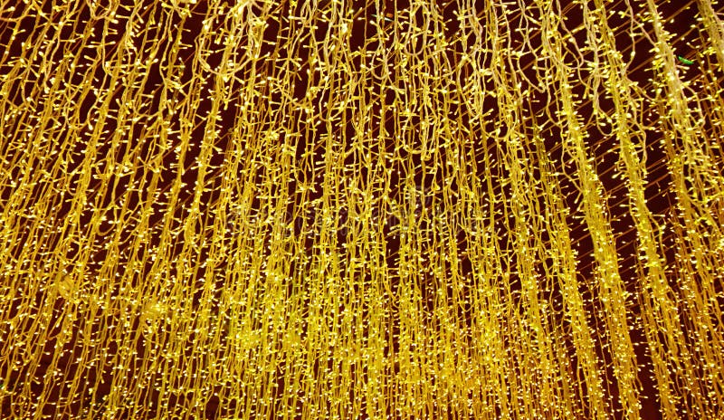 Glittering Gold Illuminated Ceiling String Lights for Background Stock ...