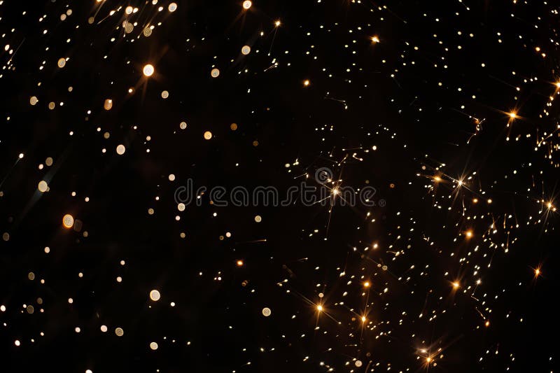 Glittering Golden Sparks Bokeh Against Dark Background Stock Photos ...