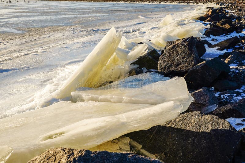 Glittering ice in the sun stock photo. Image of ripples - 85076264
