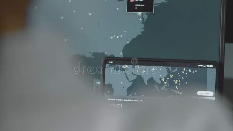 Global Cyber Attack with World Map on Computer and Mobile Phone Screen ...