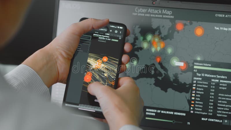 Global Cyber Attack with World Map on Computer and Mobile Phone Screen ...