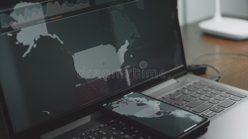 Global Cyber Attack with World Map on Mobile Phone and Computer Screen ...
