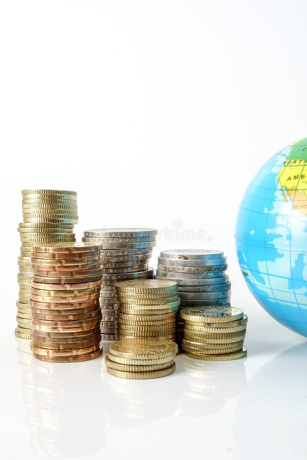 Global Economy Concept with Sphere Globe and Stacked of Coins Over ...