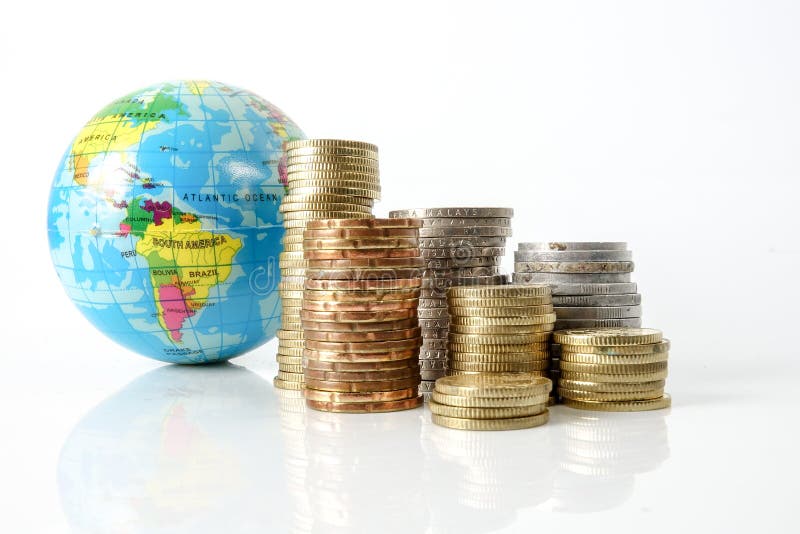 Global Economy Concept with Sphere Globe and Stacked of Coins Over ...
