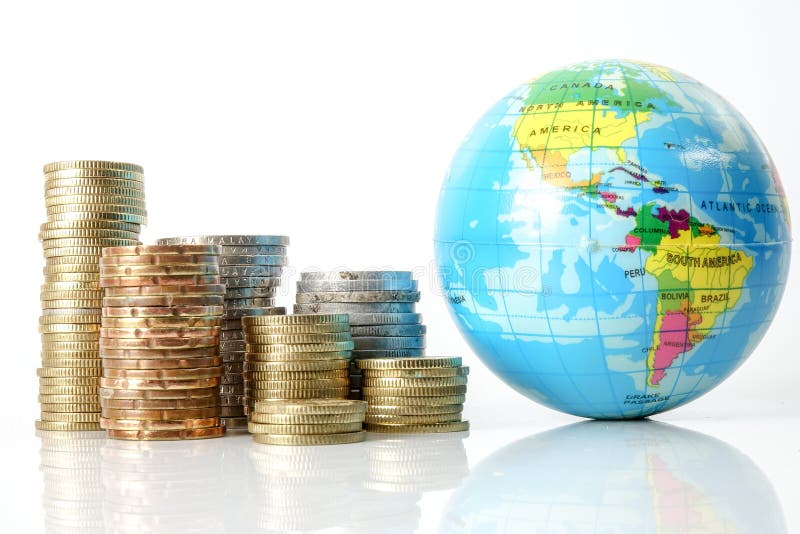 Global Economy Concept with Sphere Globe and Stacked of Coins Over ...
