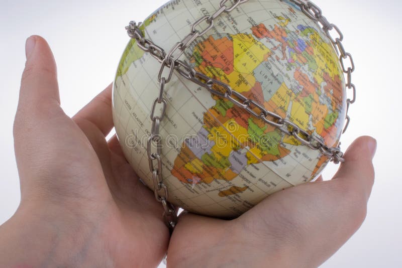 Globe in chains stock image. Image of tied, security - 67083527