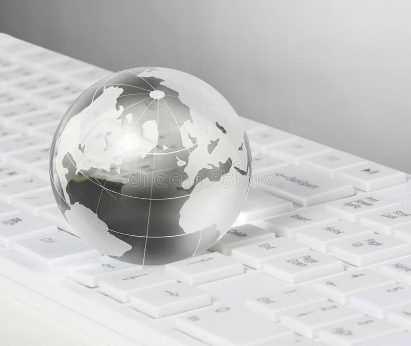 Transparent Globe on a Laptop Keyboard Stock Image - Image of computer ...