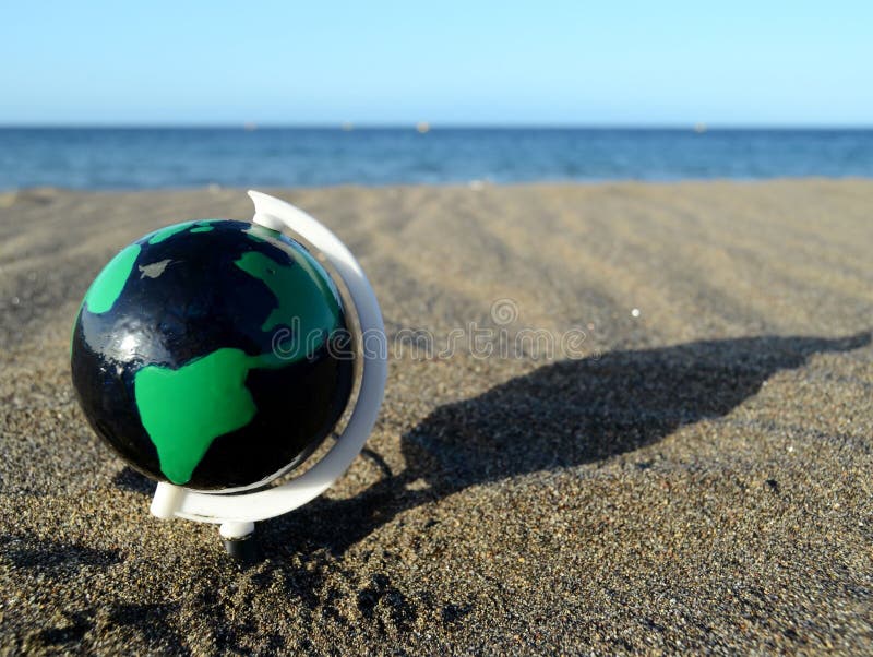 Globe Earth on the Beach stock image. Image of nature - 242995083