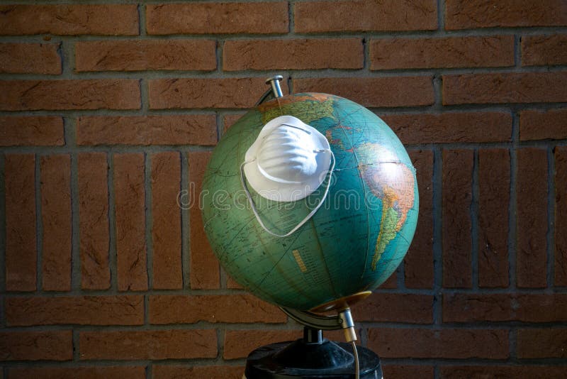 Globe Earth with Mask Protection Against Coronavirus Stock Photo ...