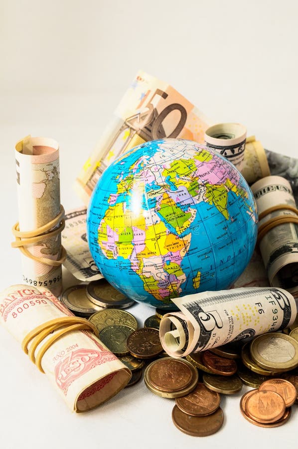 Earth and Money on a Two Pan Balance Stock Photo - Image of success ...