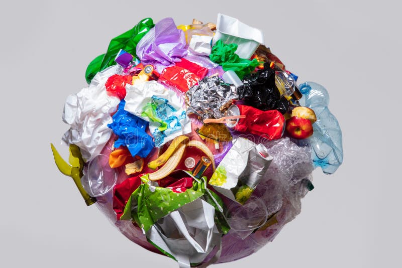 A Globe of the Earth with Trash Over White Background, the Concept of ...