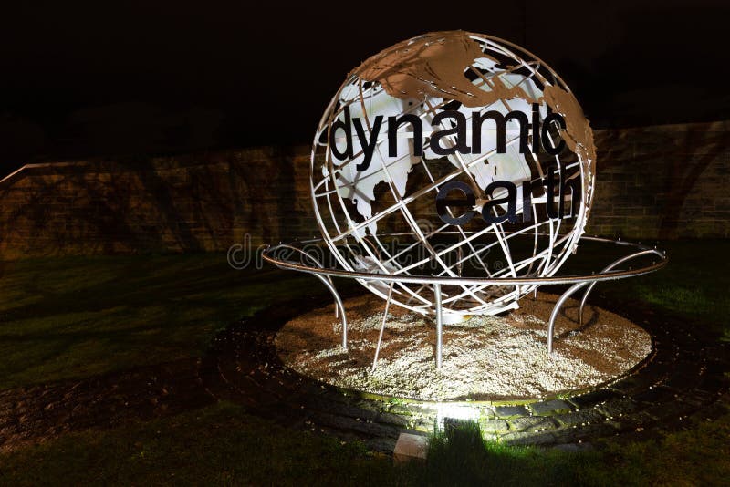 Globe at Entrance of Dynamic Earth with Black Text and Spotlights ...