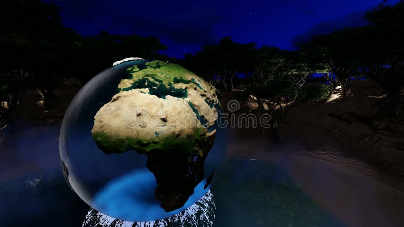 The Globe with Glass Oceans Over the Lake between Trees at Night with ...