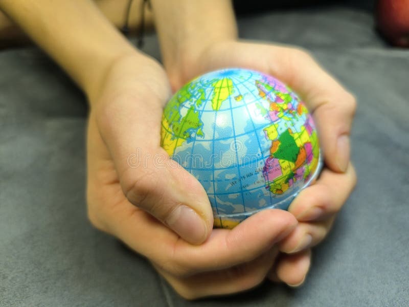 Globe Held by Human Hands. Ecology and the Concept of Globalization ...