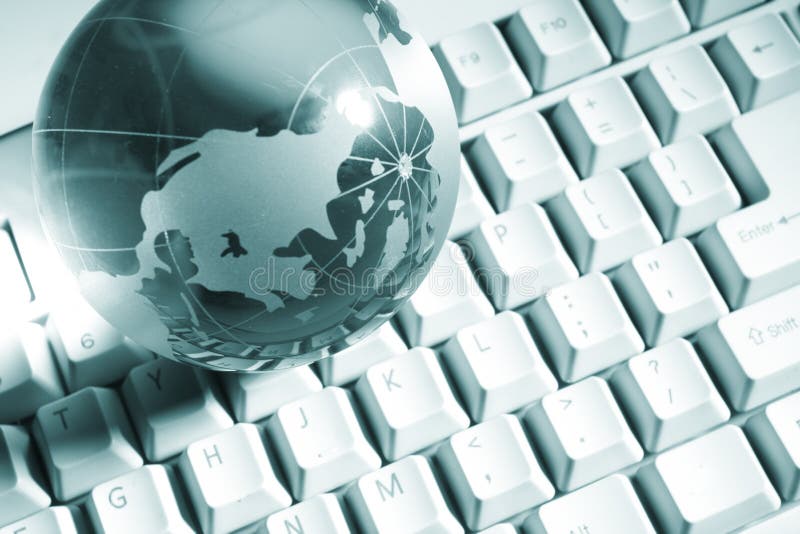 Globe on a keyboard laptop stock image. Image of laptop - 31539781