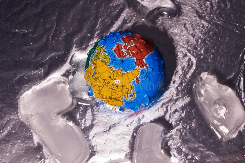 The Globe Lies in the Ice. Planet Earth. Global Warming Stock Image ...