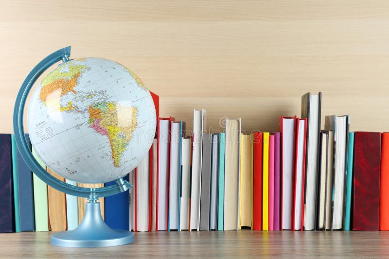 Globe and Many Books on a the Table Stock Image - Image of continent ...