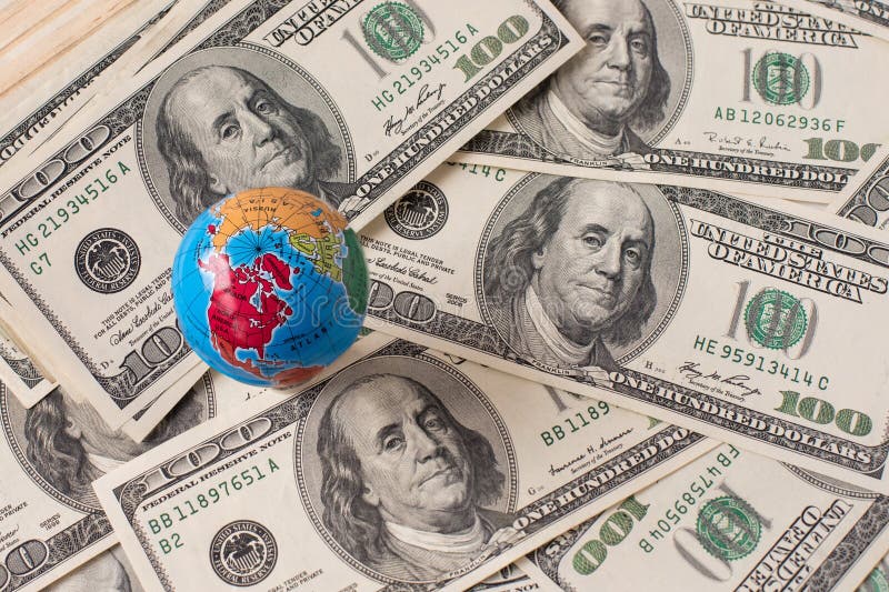 Globe Map Over Many American Dollar Banknotes Stock Photo - Image of ...