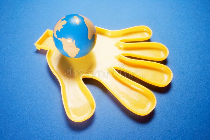 Globe on Plastic Hand stock image. Image of environment - 93055511