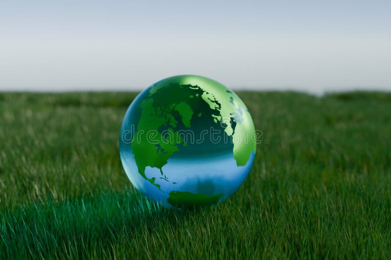 A Globe Representing Earth Sits on Green Grass, Symbolizing ...