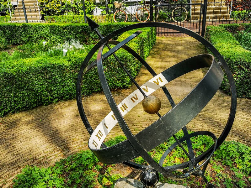 Sun dial in a park stock photo. Image of arrow, early - 163567710