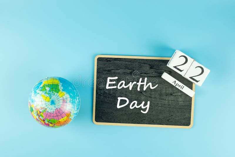 Globe and 22th April Calendar on Blue Background. Happy Earth Day and ...