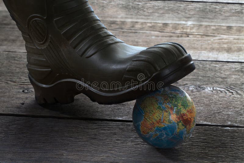 Globe Under the Foot in a Rubber Boot Stock Photo - Image of save ...