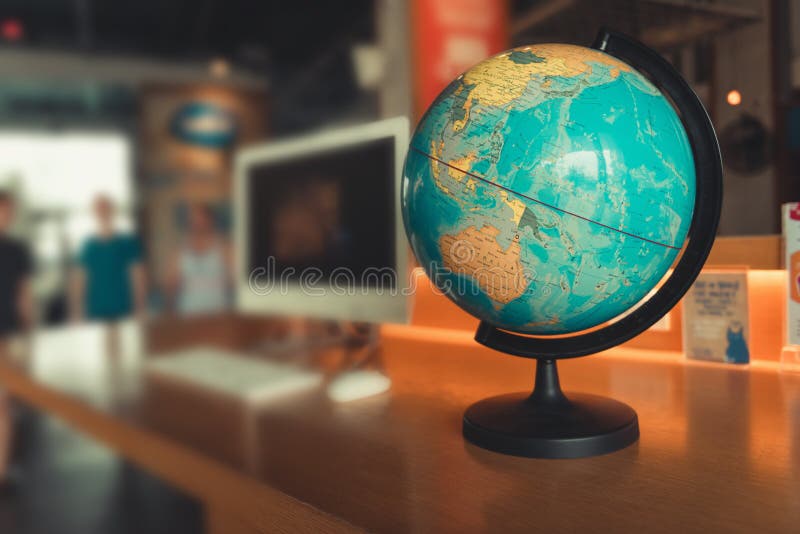 Globe World Map and Computer on Desktop, Around the World Travel Stock ...