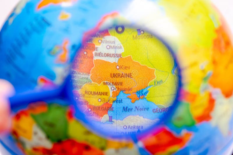 Globe with the World Map of Ukraine Seen Under a Magnifying Glass ...